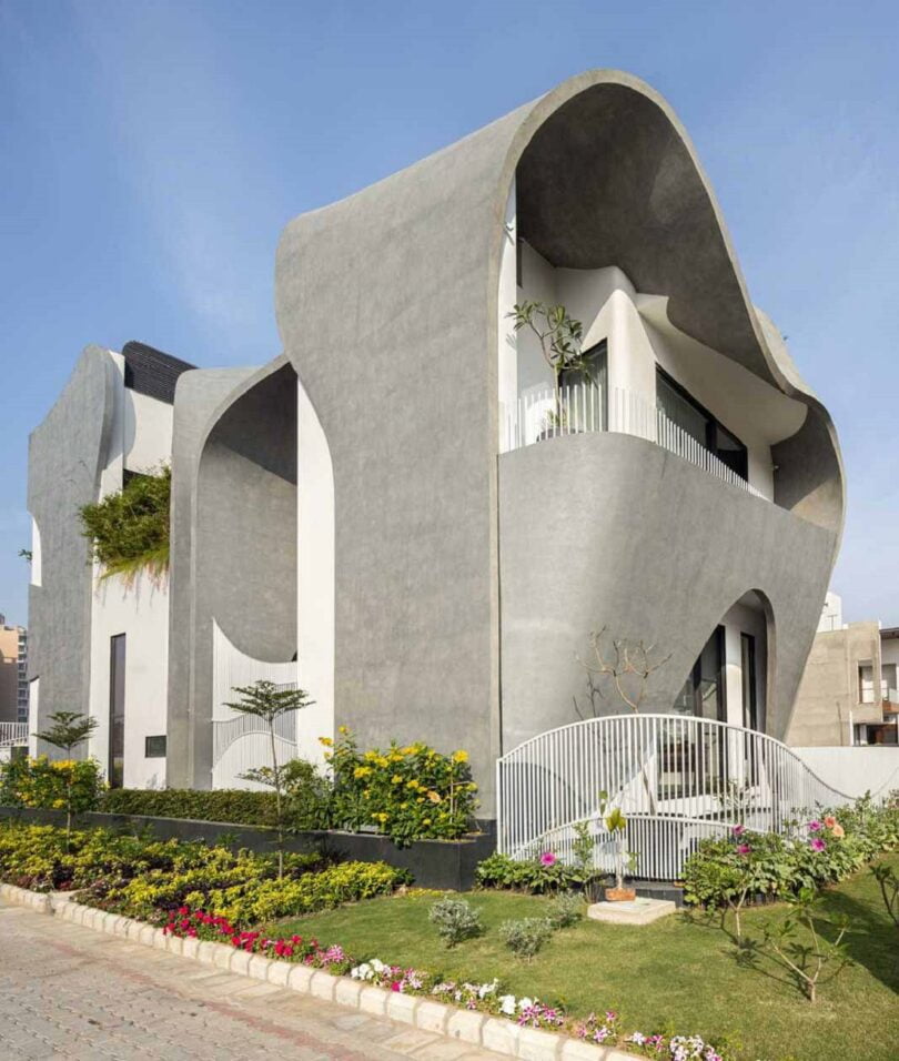 Folds of A Ribbon: Modern Villa’s Sculptural Elevation - Architecture Blog